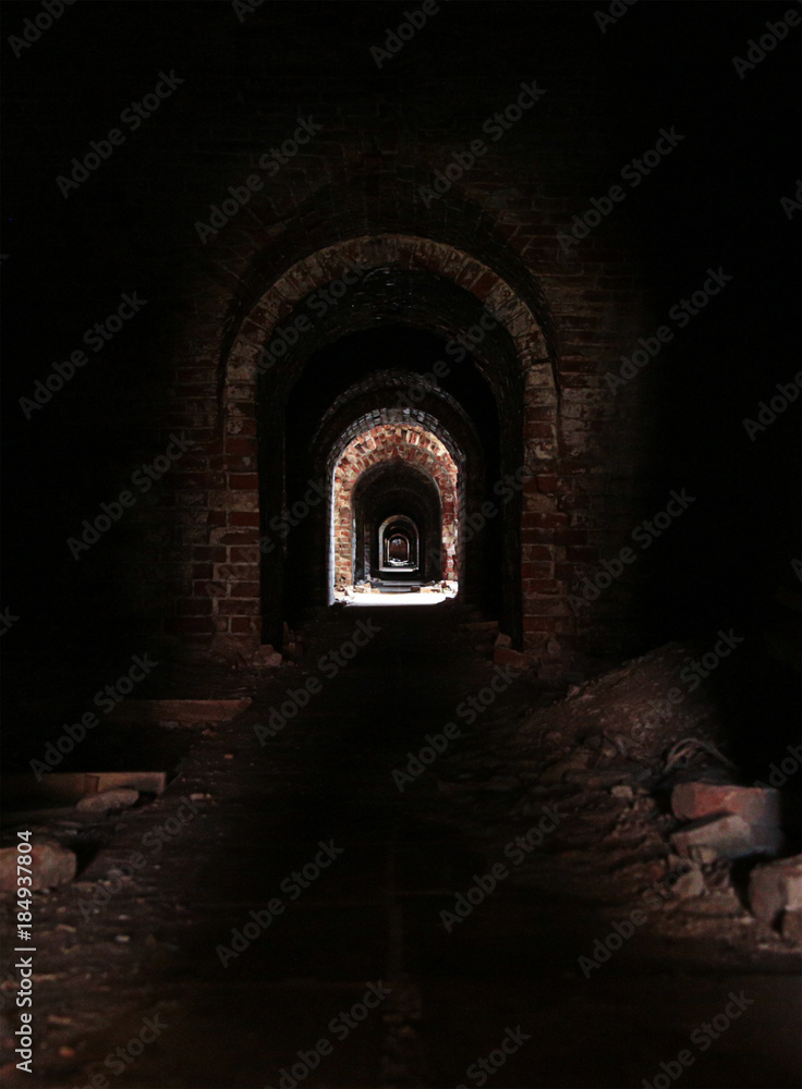 uninhabited horror horrible long corridor dark with a distant bright ...