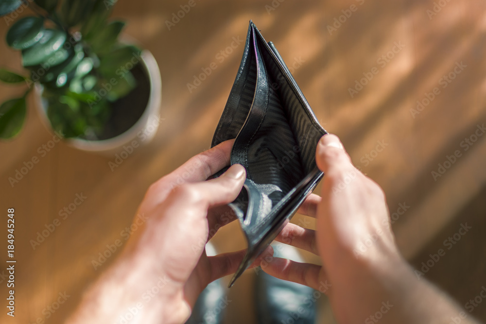 Wallet without money. Be completely free of money. Stock Photo | Adobe ...