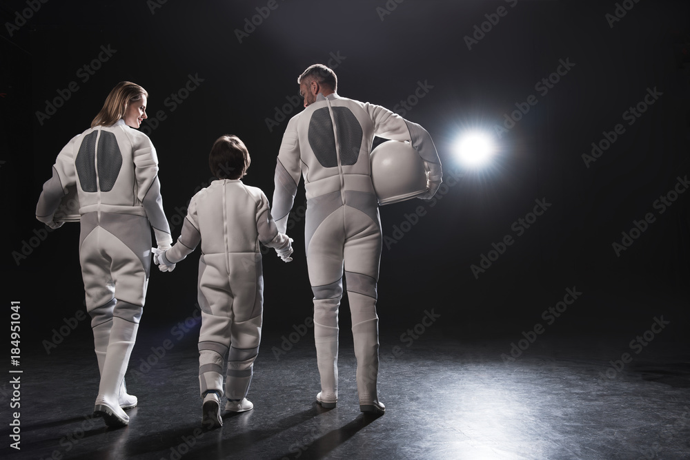 Astronauts In Space Holding Hands