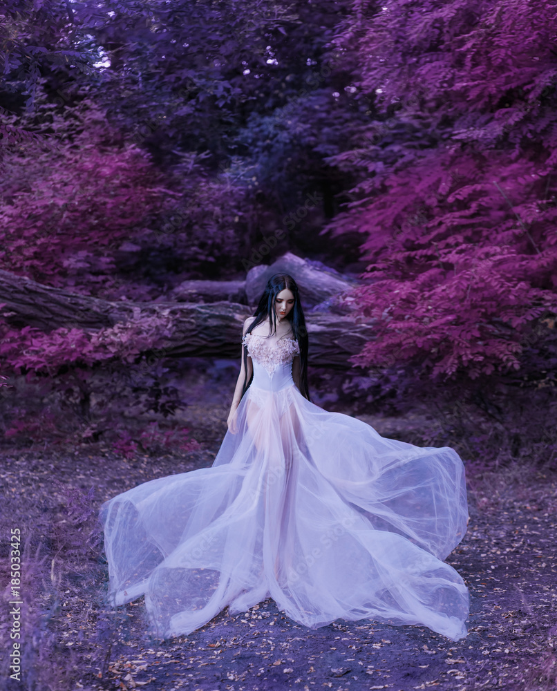 Fragile fantasy girl, in white transparent dress fly in wind motion ...