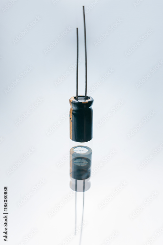 bipolar electric capacitor on white background. microelectronic ...