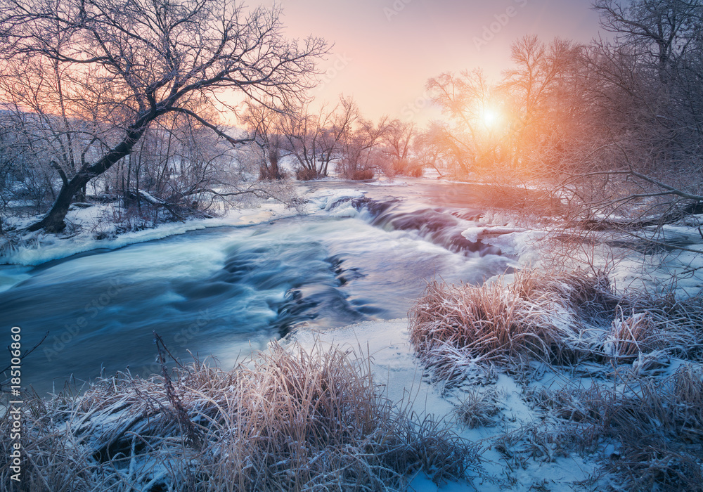 Winter forest with amazing river at sunset. Winter landscape with snowy ...