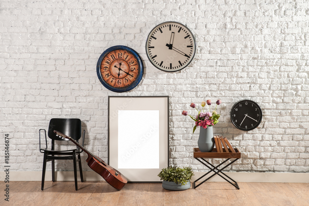 world clocks and empty frame room interior decor brick background Stock ...