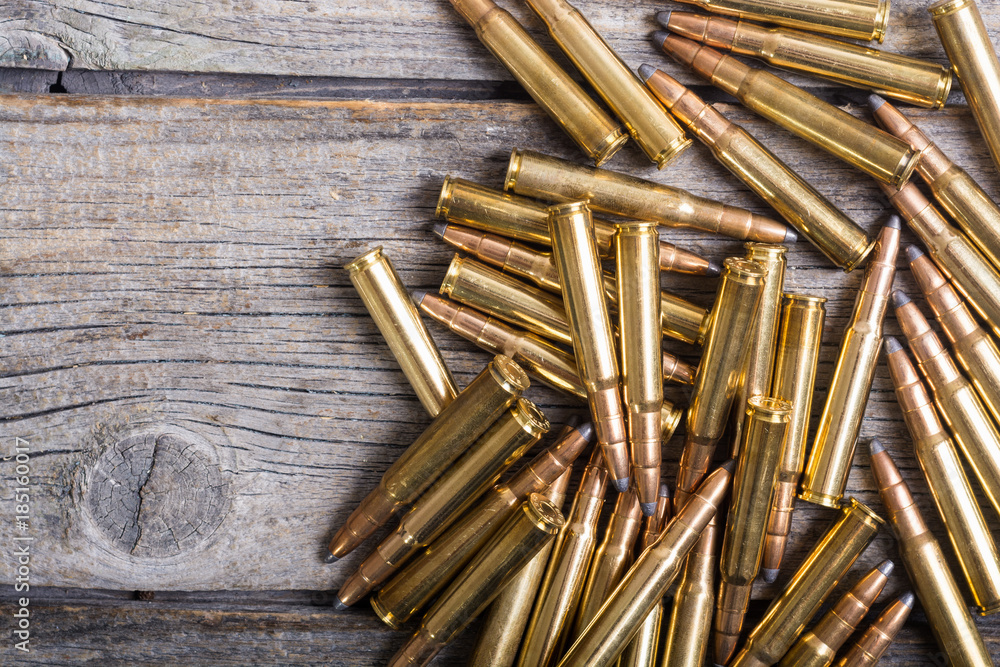 Bullets . Gun cartridge 8mm caliber background Stock Photo | Adobe Stock