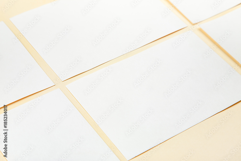 Blank white paper cards on a soft color background, business cards ...