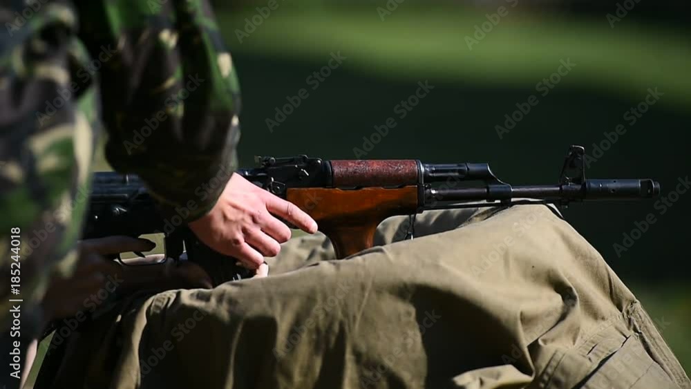 Outdoor shooting with automatic rifle in a shooting range Stock Video ...
