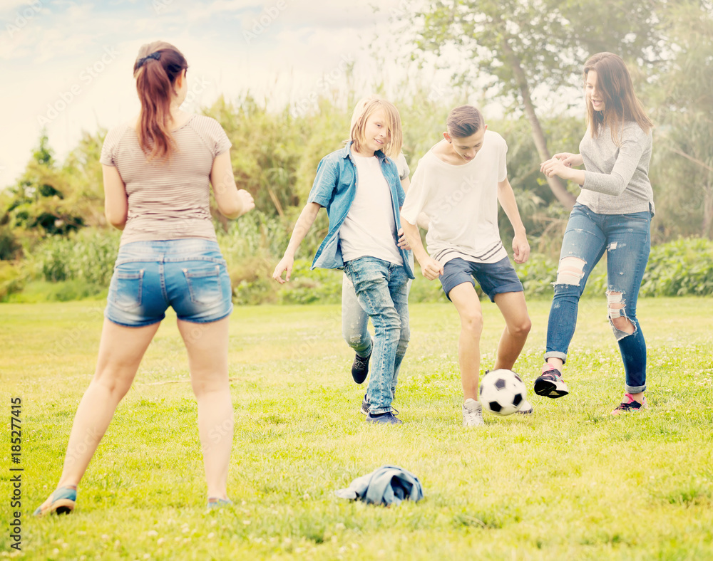 People Playing Football In The Park