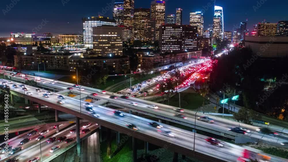 Cinematic urban aerial time lapse of downtown Los Angeles freeway ...