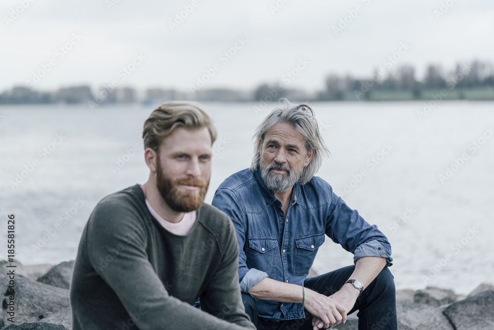 Father and son meeting outdoors, portrait Stock Photo | Adobe Stock