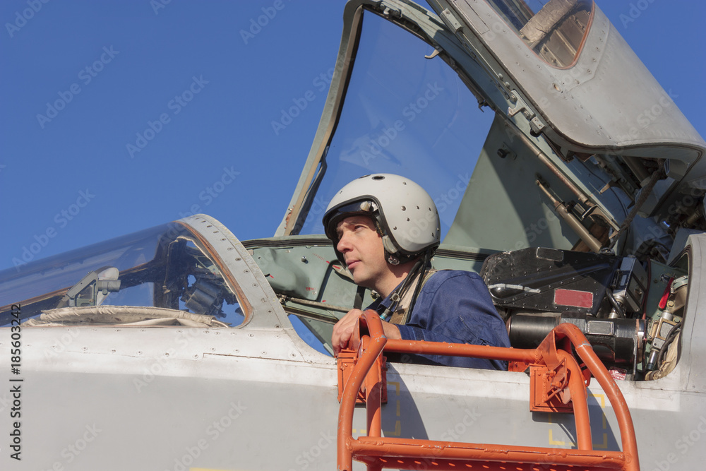 Military pilot in the cockpit of a jet aircraft Stock Photo | Adobe Stock