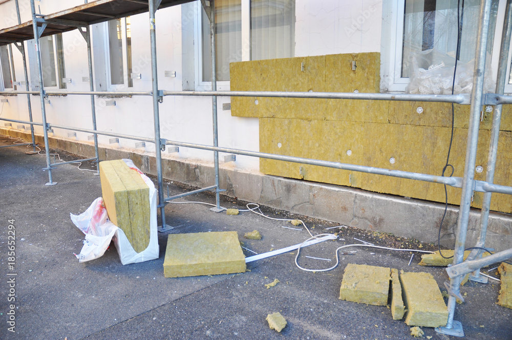 Solid wall insulation with rock wool. Energy efficiency house wall ...