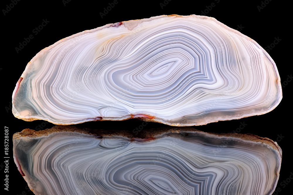 Amazing Banded Agate Crystal cross section cut isolated on black ...