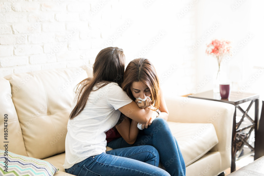 Comforting a crying friend Stock Photo | Adobe Stock
