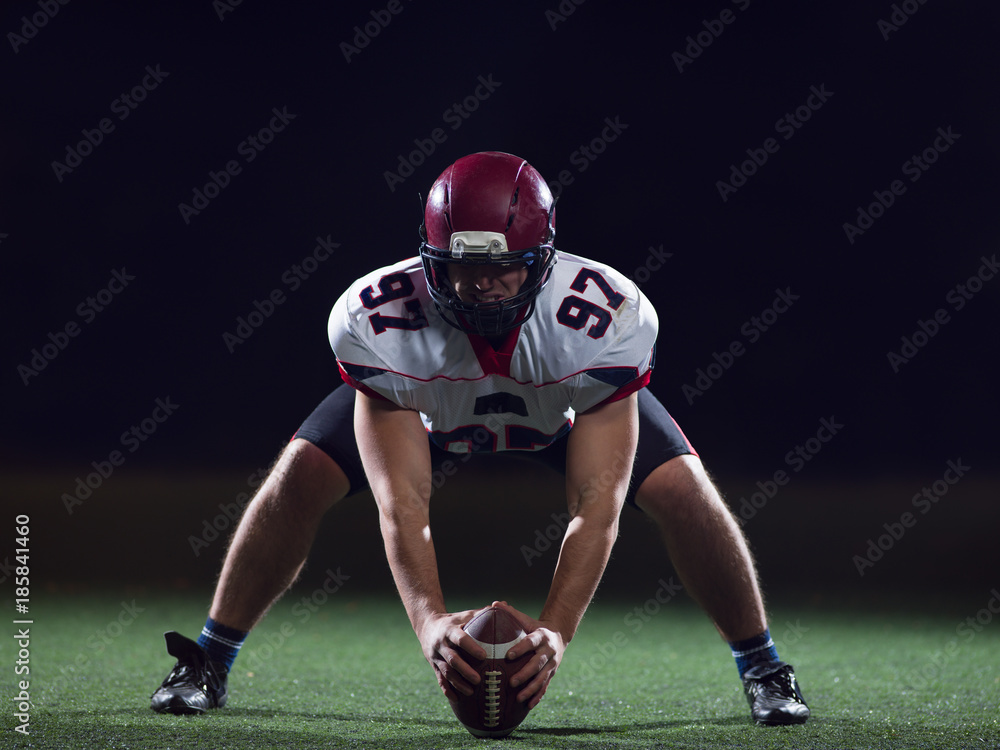 American football player starting football game Stock Photo | Adobe Stock