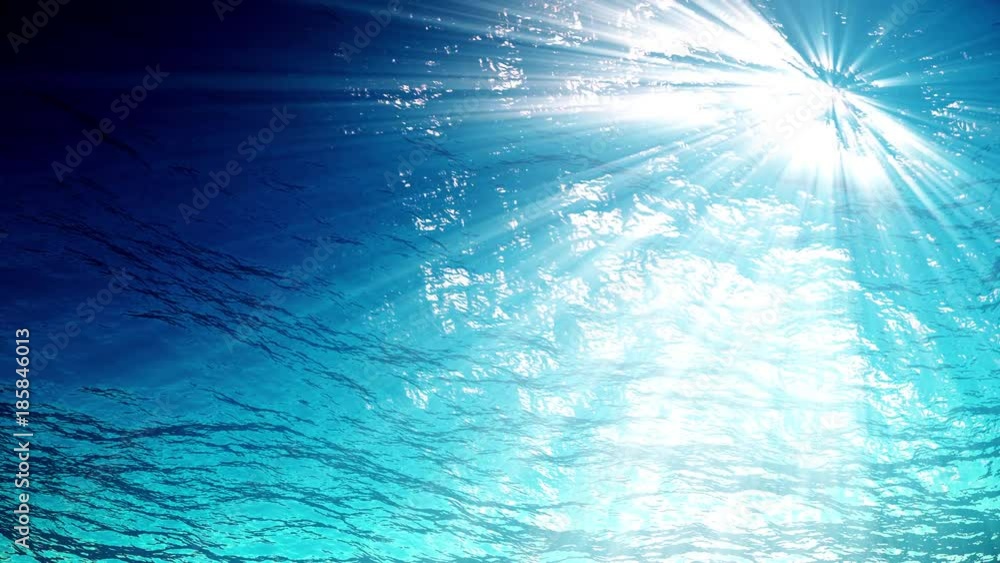 Looping animation of ocean waves from underwater with floating plankton ...