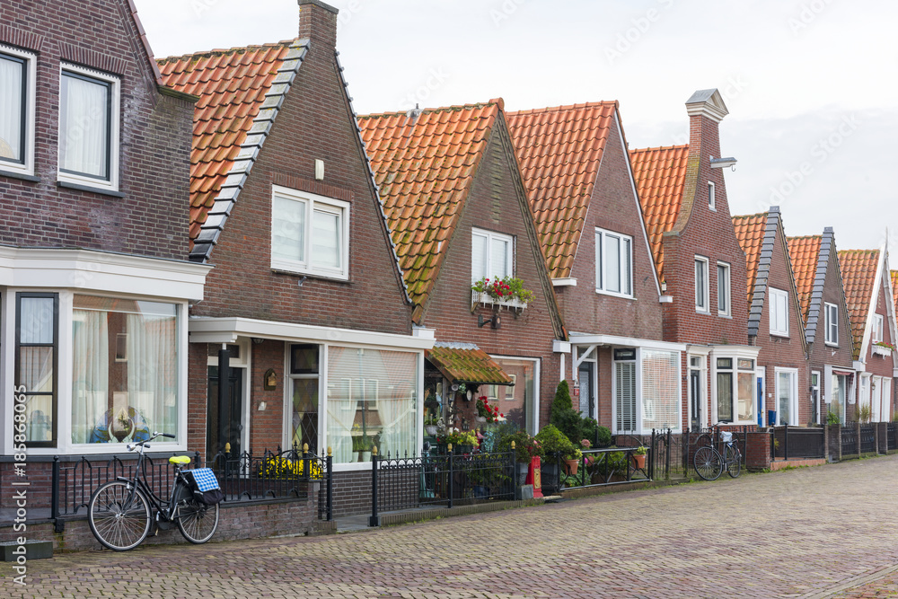 Volendam is a town in North Holland in the Netherlands. Colored houses ...