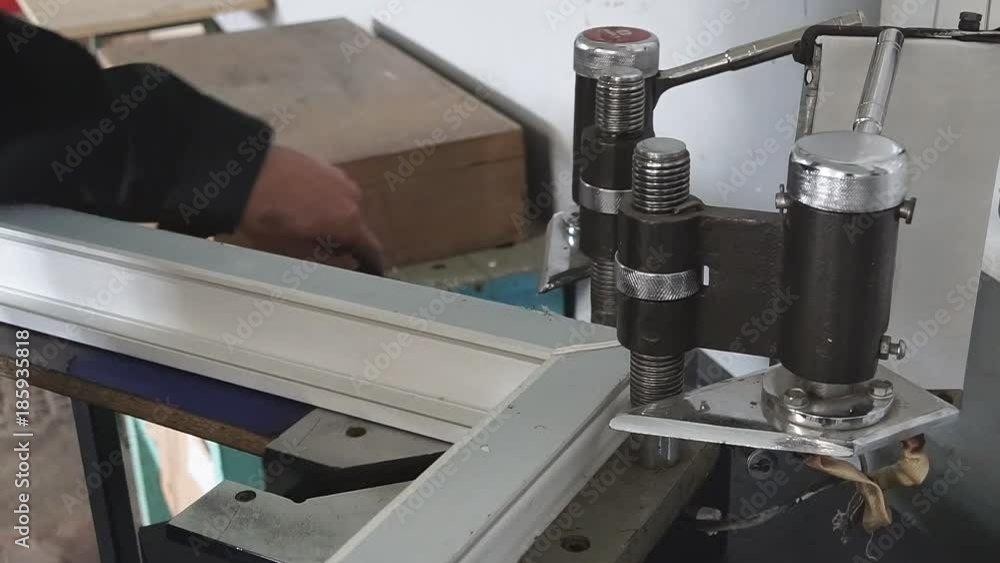 Worker Operating Welding Machine in Factory. Pvc Window Welding Machine ...