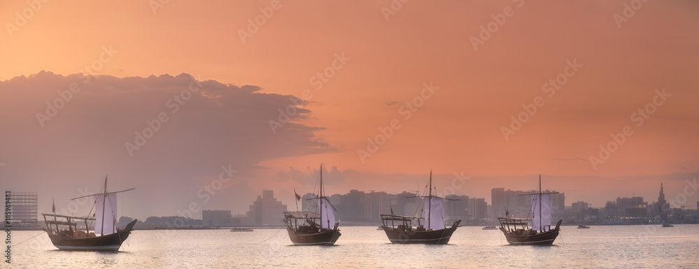 Traditional Arabic Dhow boats in Doha harbour, Qatar Stock Photo ...