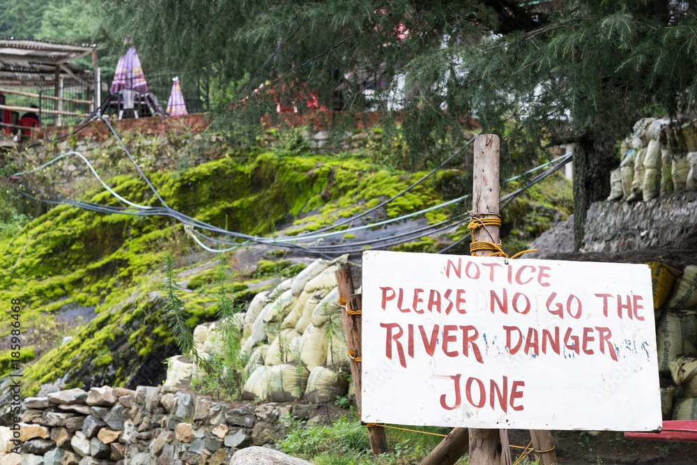 Warning Sign Next to Dangerous River in Kasol, India Stock Photo ...