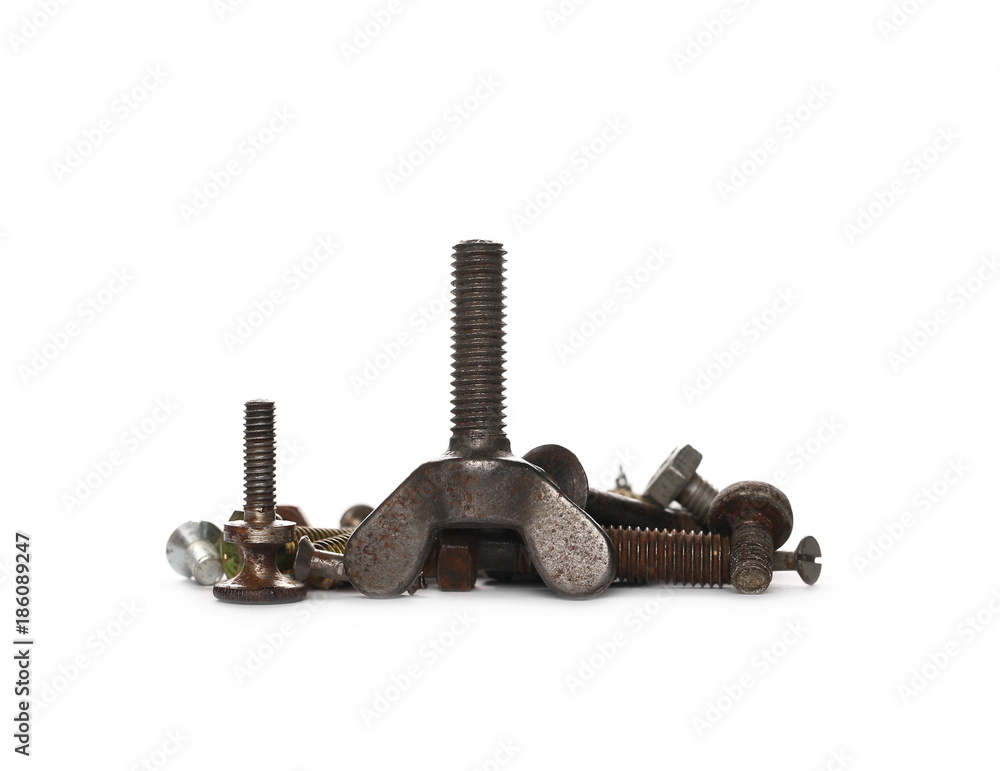 Pile of old rusty screw heads, bolts, metal nuts, isolated on white ...