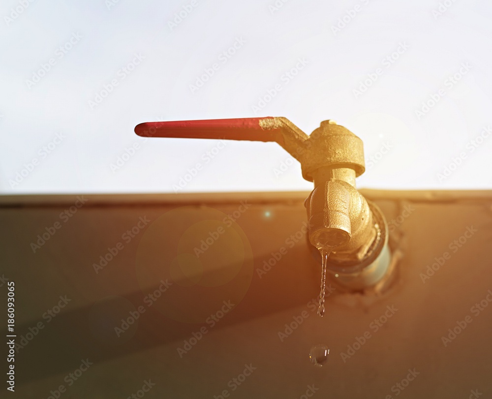 The water is not close./The girls stand at the sign boards at the ...