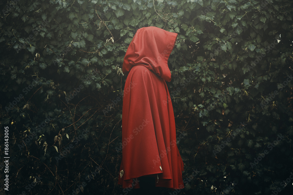 Red hood figure alone Stock Photo | Adobe Stock