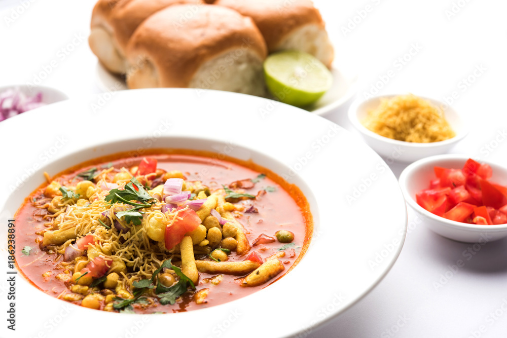 Misal Pav or misalpav, Misal Pav with Farsan. Traditional Indian spicy ...
