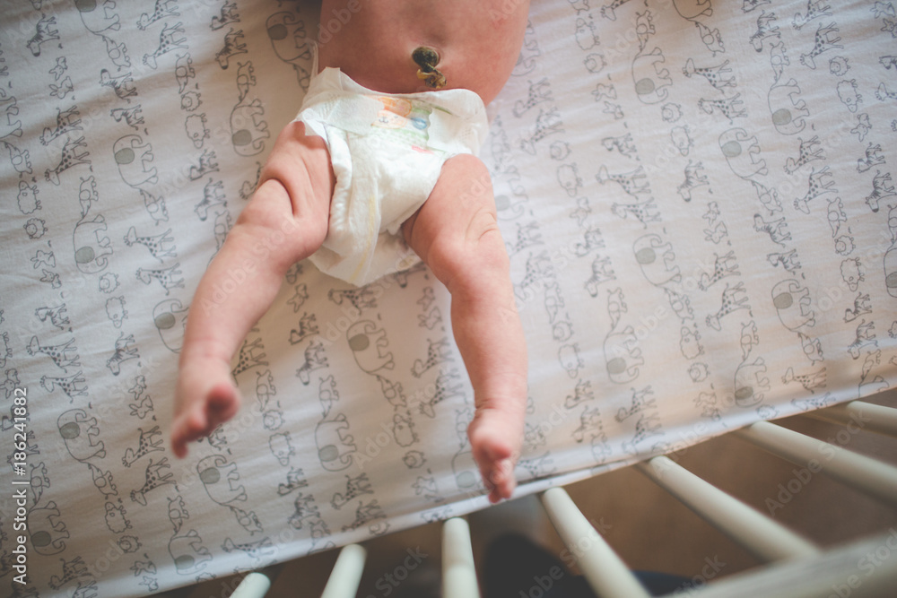 Newborn Legs Stretching Stock Photo | Adobe Stock