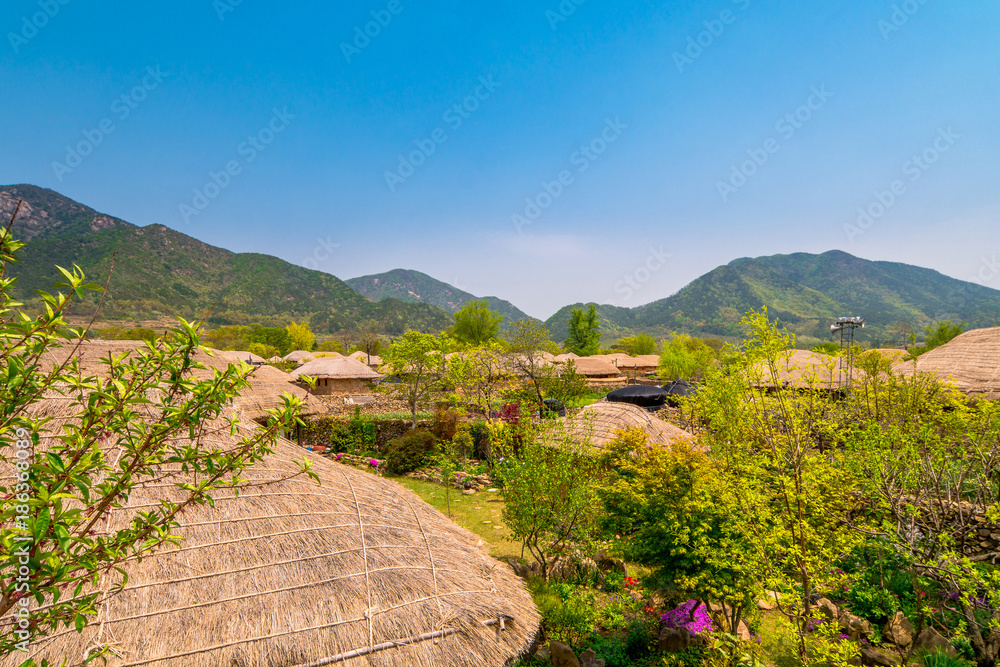 Beautiful green in spring morning of Naganeupseong Folk Village in ...