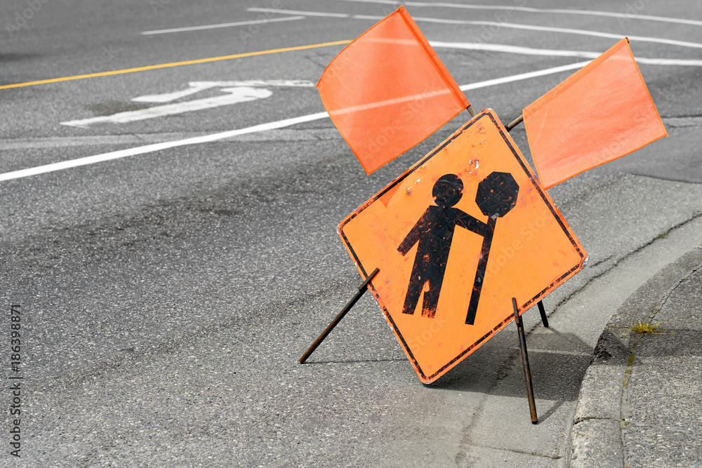 Construction flagger ahead sign Stock Photo | Adobe Stock
