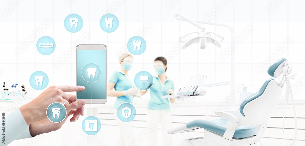Foto de dentist hand touch smart phone screen, teeth icons and symbols ...