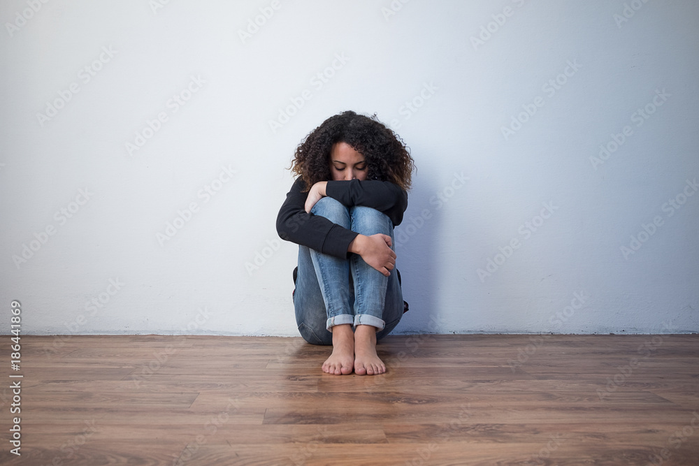 Sad and lonely black girl feeling alone Stock Photo | Adobe Stock