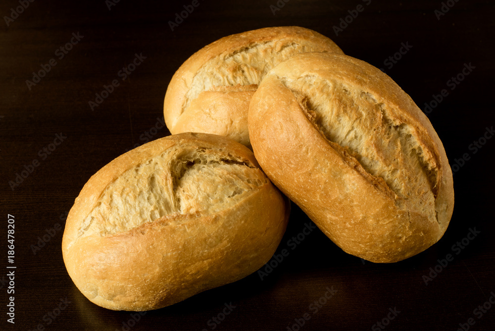 Small bread rolls, brötchen - breakfast rolls - on dark background ...