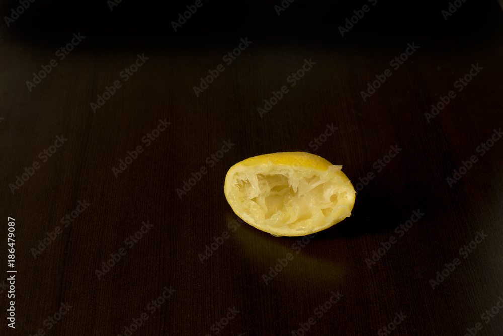 Squeezed lemon skins on dark background - lemon peel - dark food ...