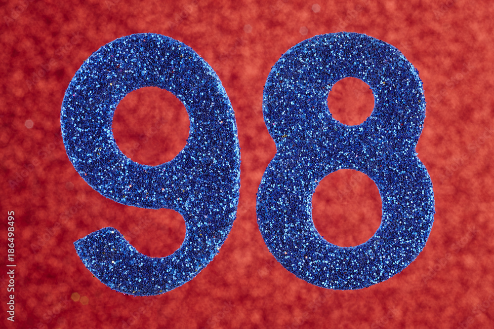 Number ninety-eight blue color over a red background. Anniversary ...