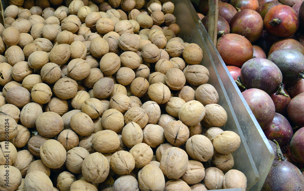 Street food with longans or dragon eye fruit among various fresh ...