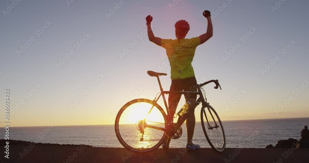 Success, achievement and accomplishment - man cycling cheering and ...
