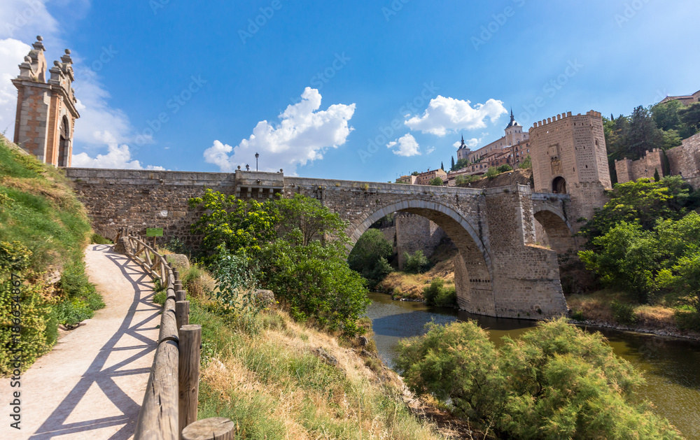 Alcazar and alcantara bridge of toledo skyline, Spain Stock Photo ...