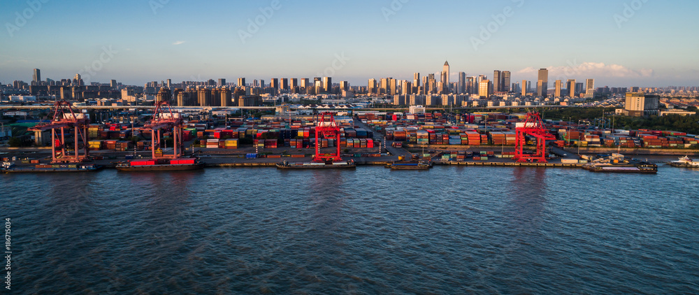 shanghai container terminal at nightfall Stock Photo | Adobe Stock
