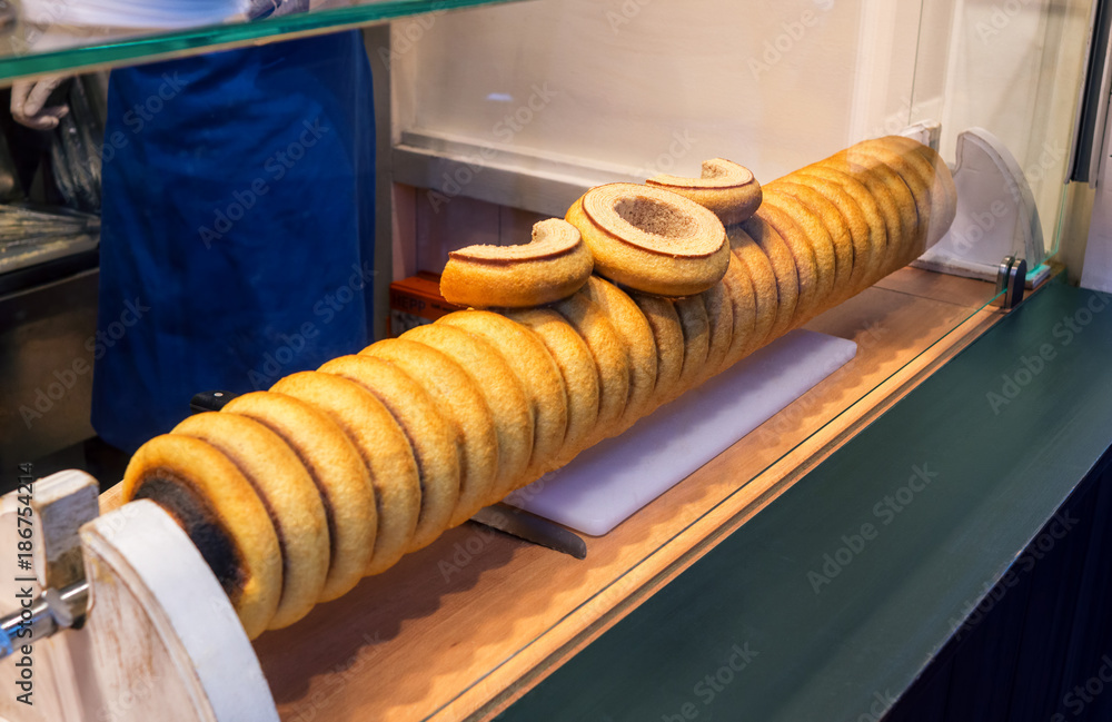 Baumkuchen or Tree Cake, a German spit cake behind glass at a shop ...