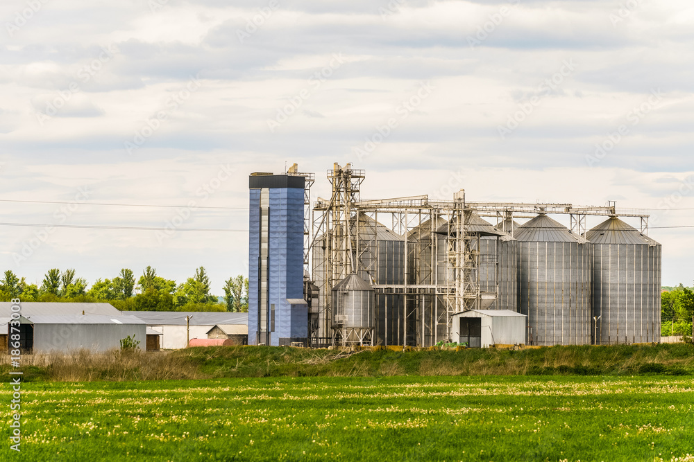 Agricultural grain dryer complex. Modern granary with weighing station ...