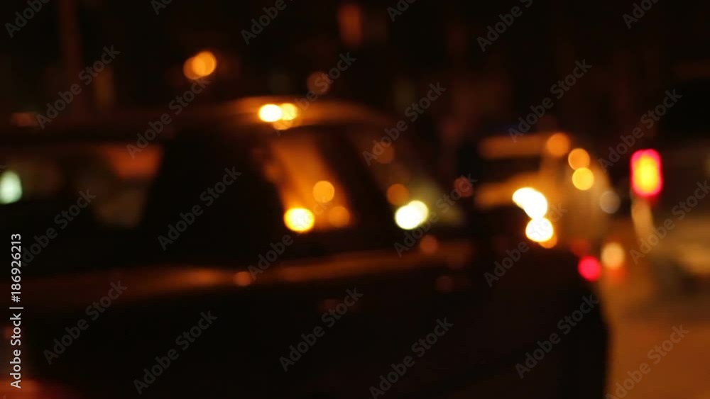 Patrol car arriving at scene of road accident, cars driving night city ...