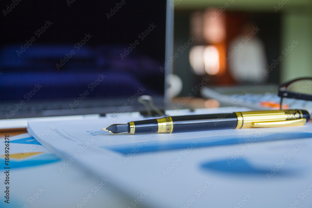 Pen,keyboard,calculator,report graph chart on office table,for Business ...