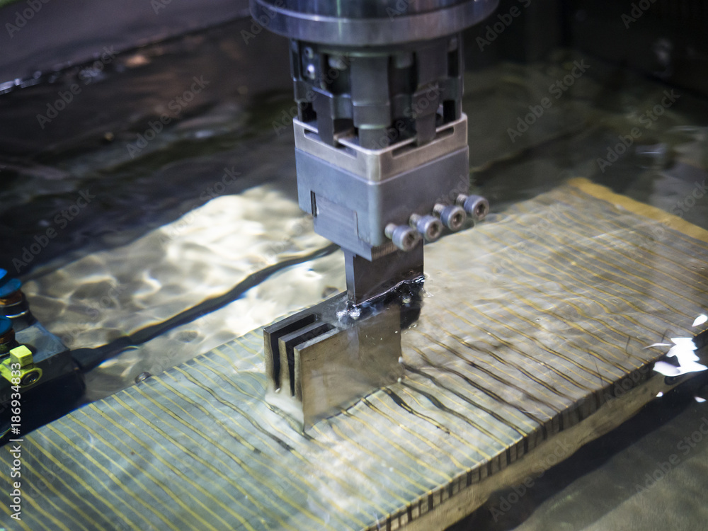 operator use EDM electrod to make precision mold and die Stock Photo ...