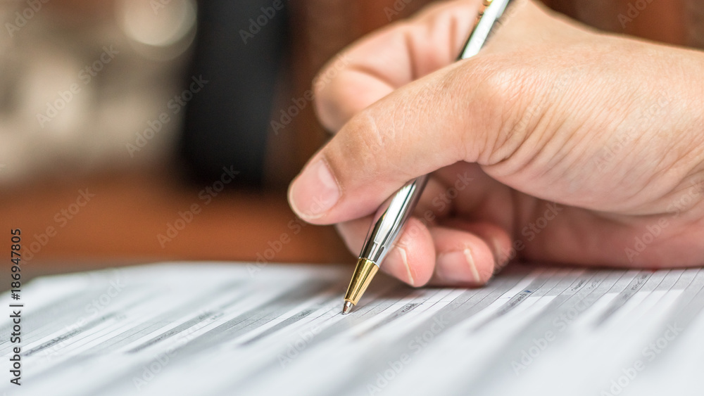 Administrator's hand fill in business schedule form document writing on ...