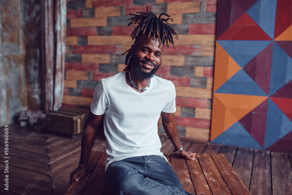 African American man with dreadlocks and a white T-shirt. Mock-up ...