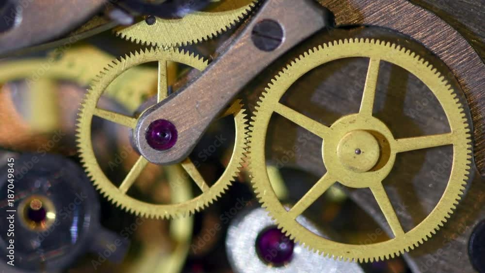Clock or stopwatch mechanism close-up. Rotating action of watch gear ...