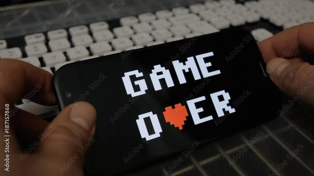 Browsing or watching on a smartphone: a cute Game Over text message ...