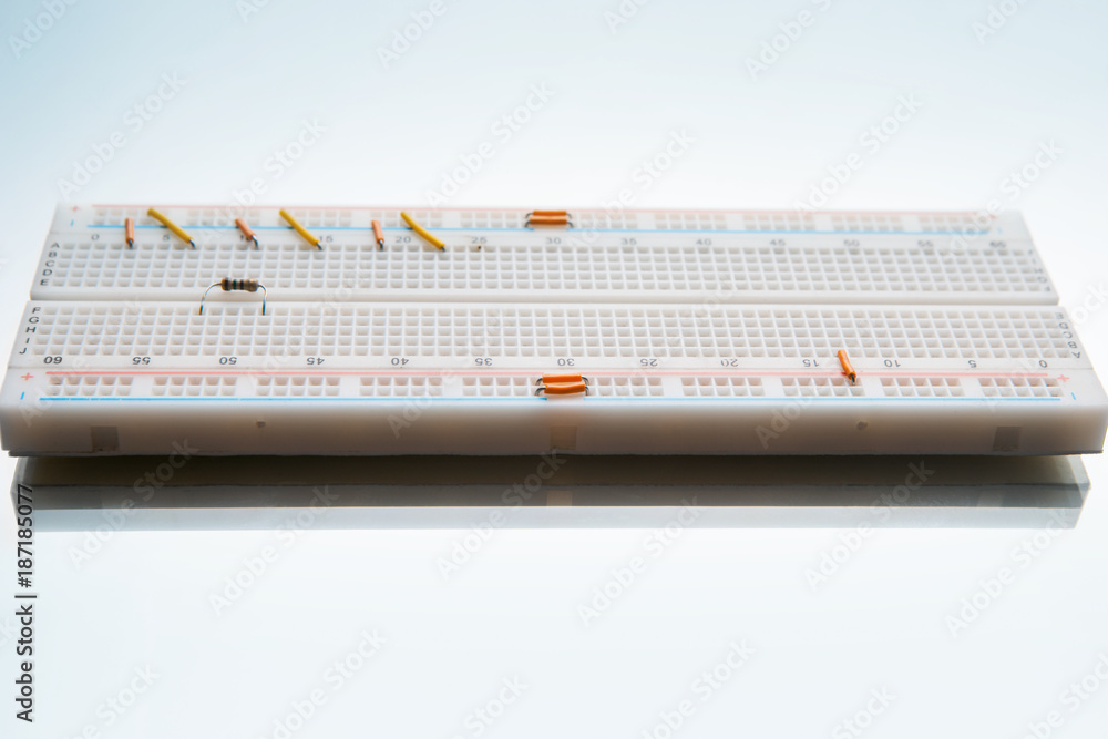 Solderless Circuit Breadboard On White Background Experiments With Electronics Designing
