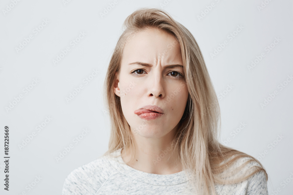 Negative human reaction, feelings and attitude. Close-up portrait of ...